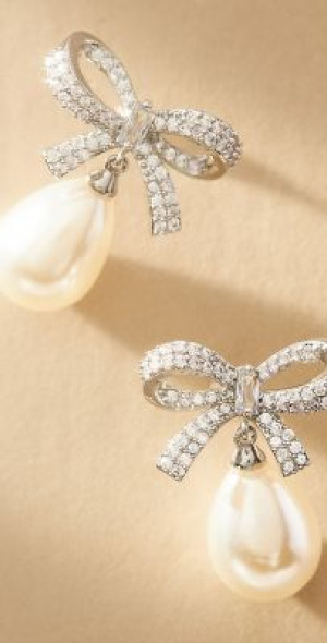 Shashi - Pavé Bow Pearl Drop Earrings