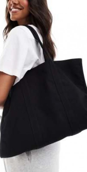 ASOS DESIGN - boxy canvas laptop tote bag in black