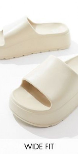 ASOS DESIGN - Wide Fit Freedom cleated flatform slides in off-white