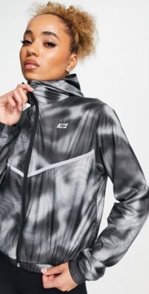 Nike Running - all over print jacket in black